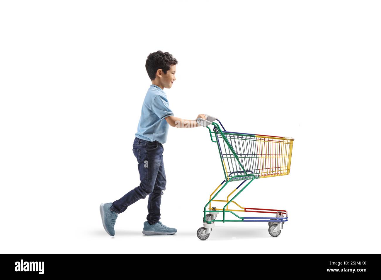 Full length profile shot of a kid walking with a small shopping cart ...