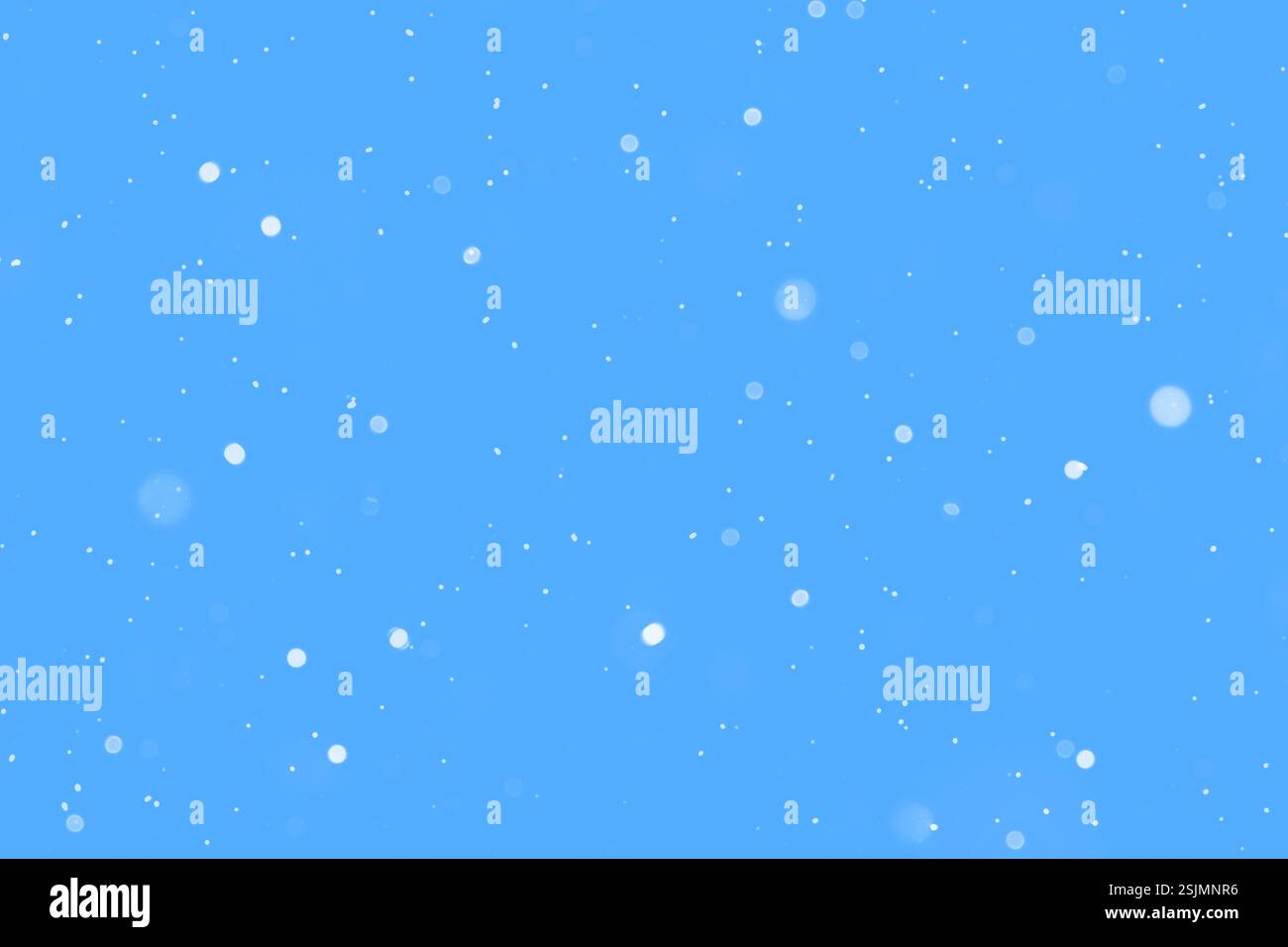 White particles falling against a clear bright blue background with a ...