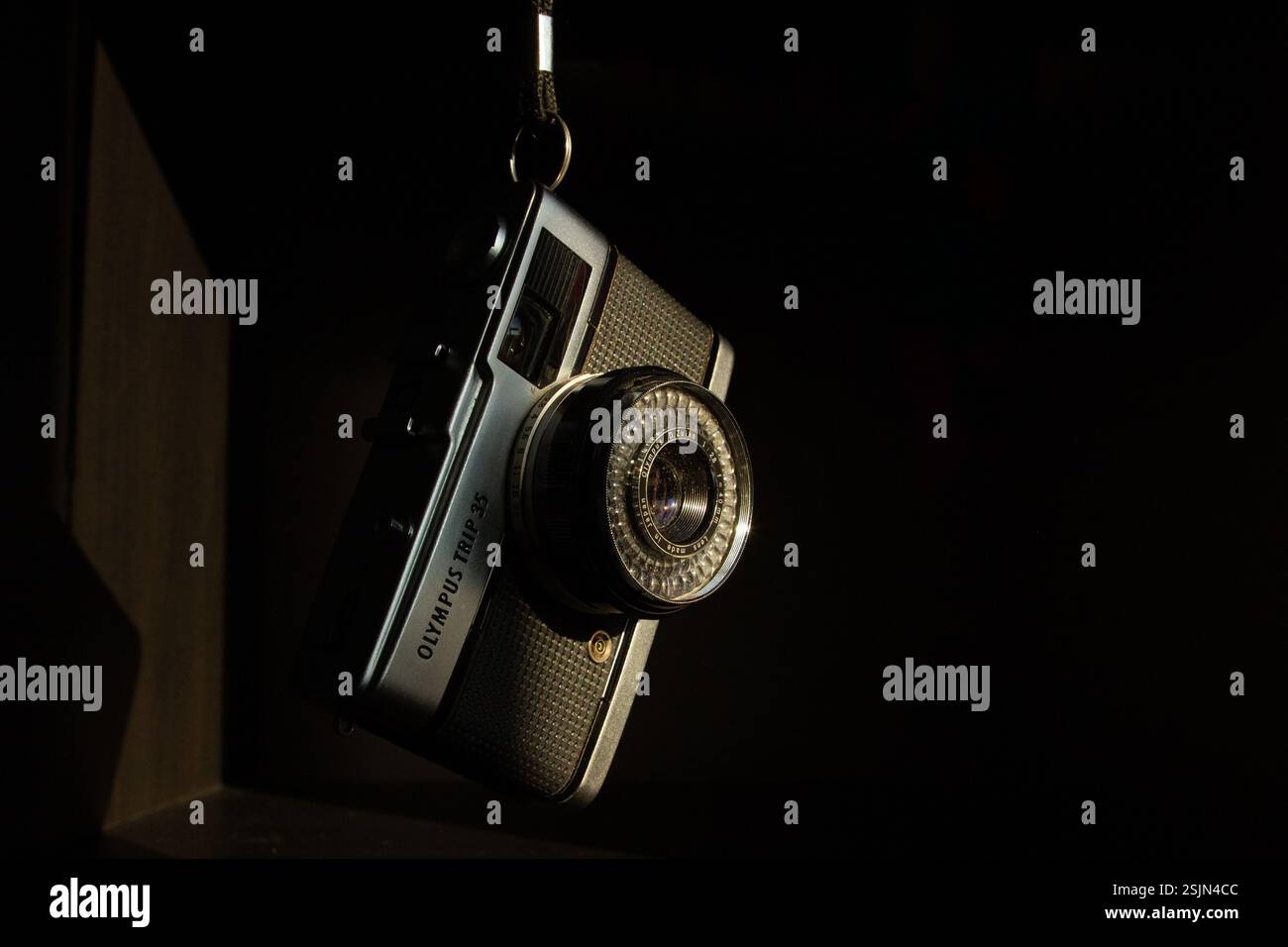 A close-up of a classic retro analogue photo camera, showcasing its ...