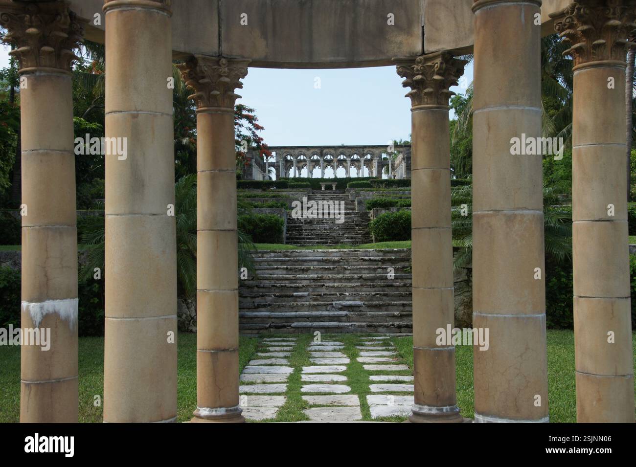 Cloisters with stone columns stand tall, Bahamas. The sun shines ...