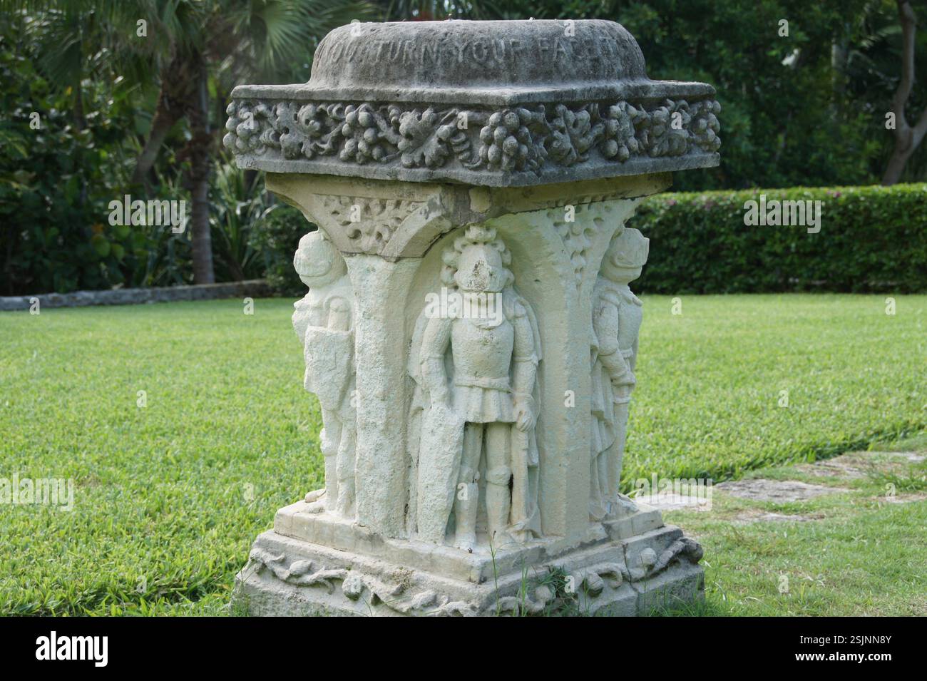 Sculpture. Group of figures in classical clothing. Central figure ...