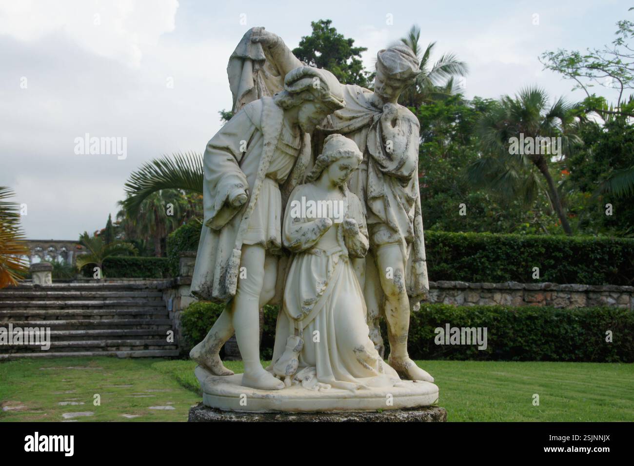 Sculpture. Group of figures in classical clothing. Central figure ...