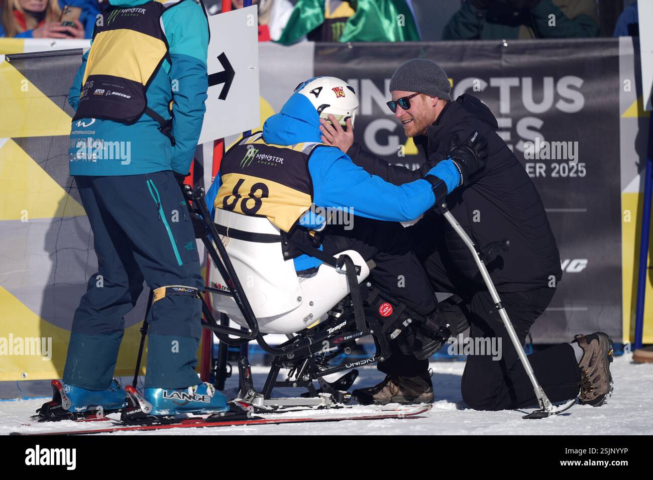 The Duke of Sussex speaks with a competitor at the Alpine Skiing and ...