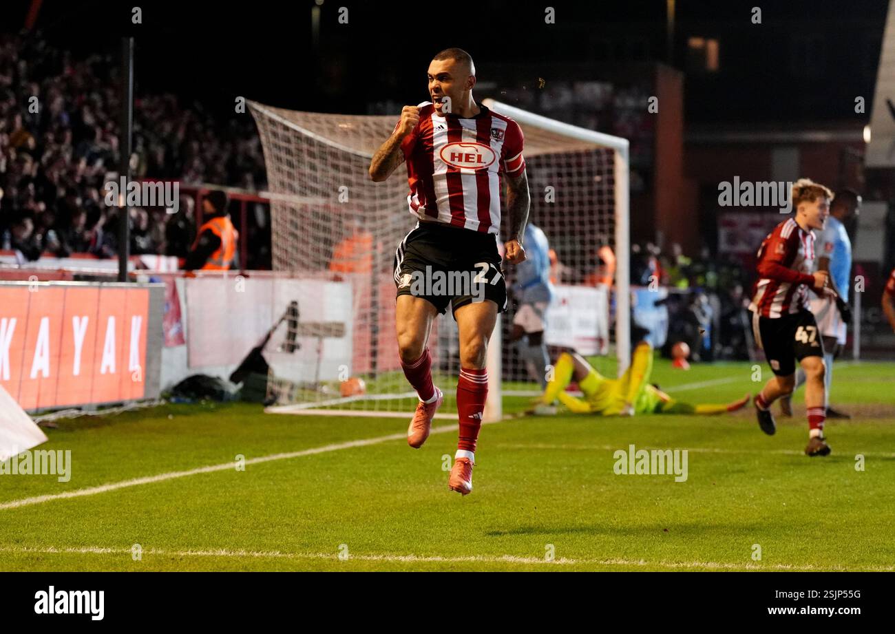 Exeter City's Josh Magennis celebrates scoring their side's second goal ...