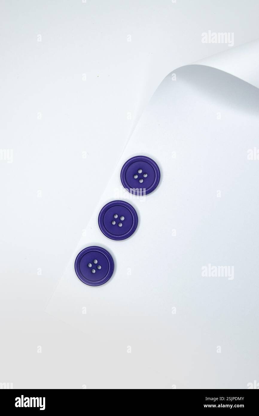 Minimalist concept image with three dark purple buttons aligned ...