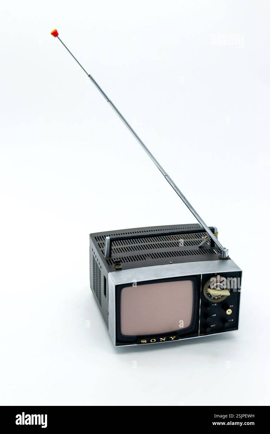 VVintage Sony 5-303W Micro TV, 1959, with an antenna against a plain ...