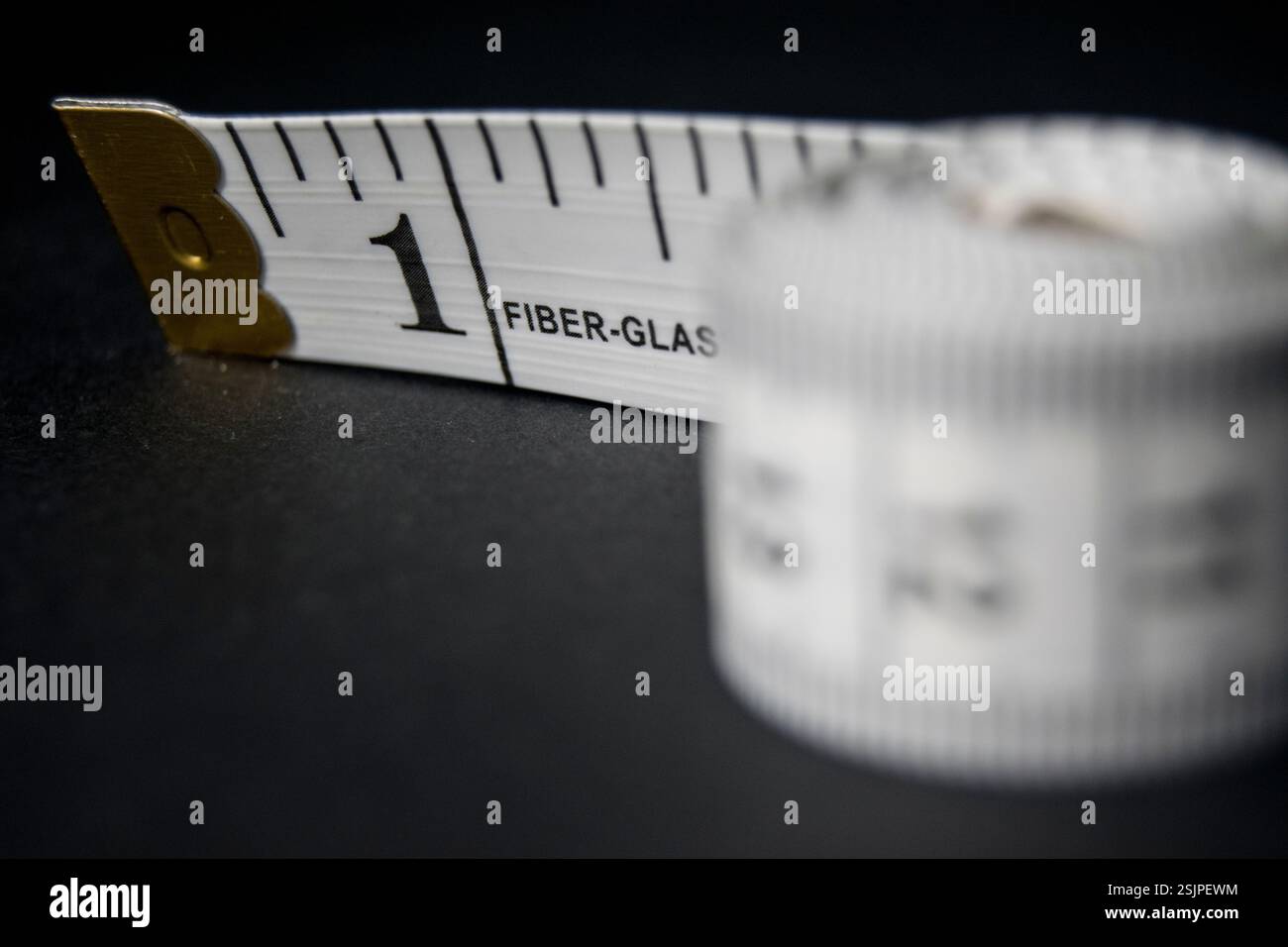 Double scale measuring tape hi-res stock photography and images - Alamy