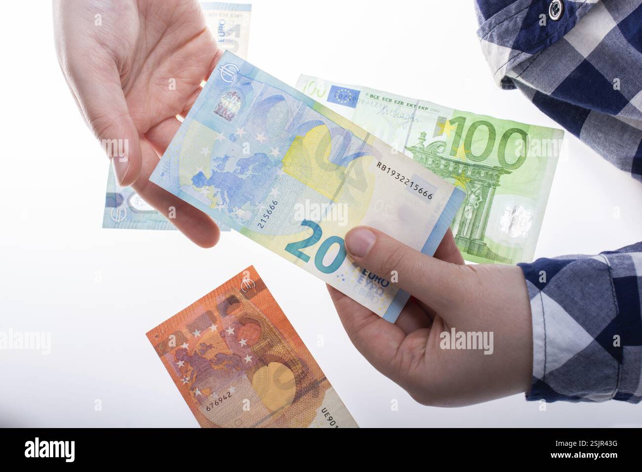 Hands exchanging euro banknotes currencies as financial activity Stock ...