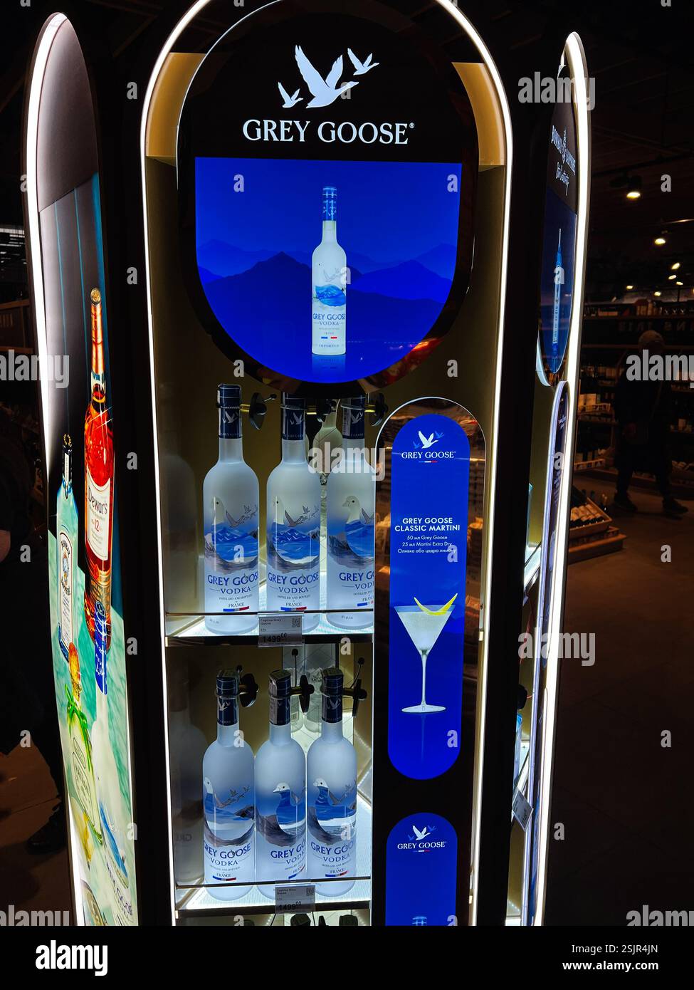 Kyiv, Ukraine - February 11, 2025: Vodka Grey Goose bottles displayed ...