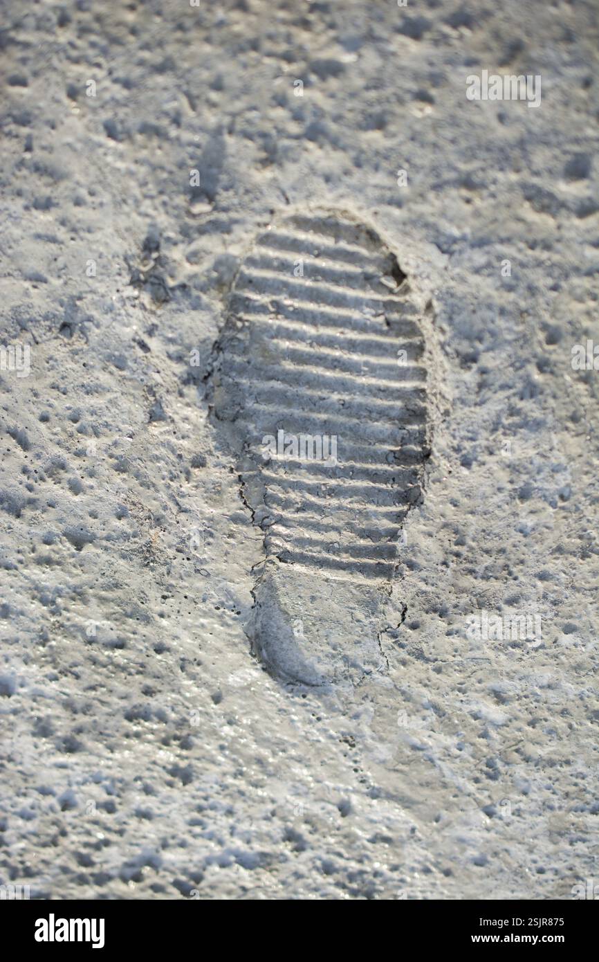 Footstep pattern seen on a concrete background Stock Photo - Alamy