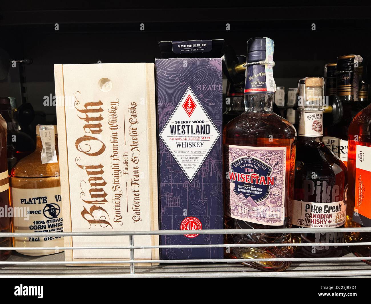 Kyiv, Ukraine - February 11, 2025: Whiskey bottles on a shelf ...