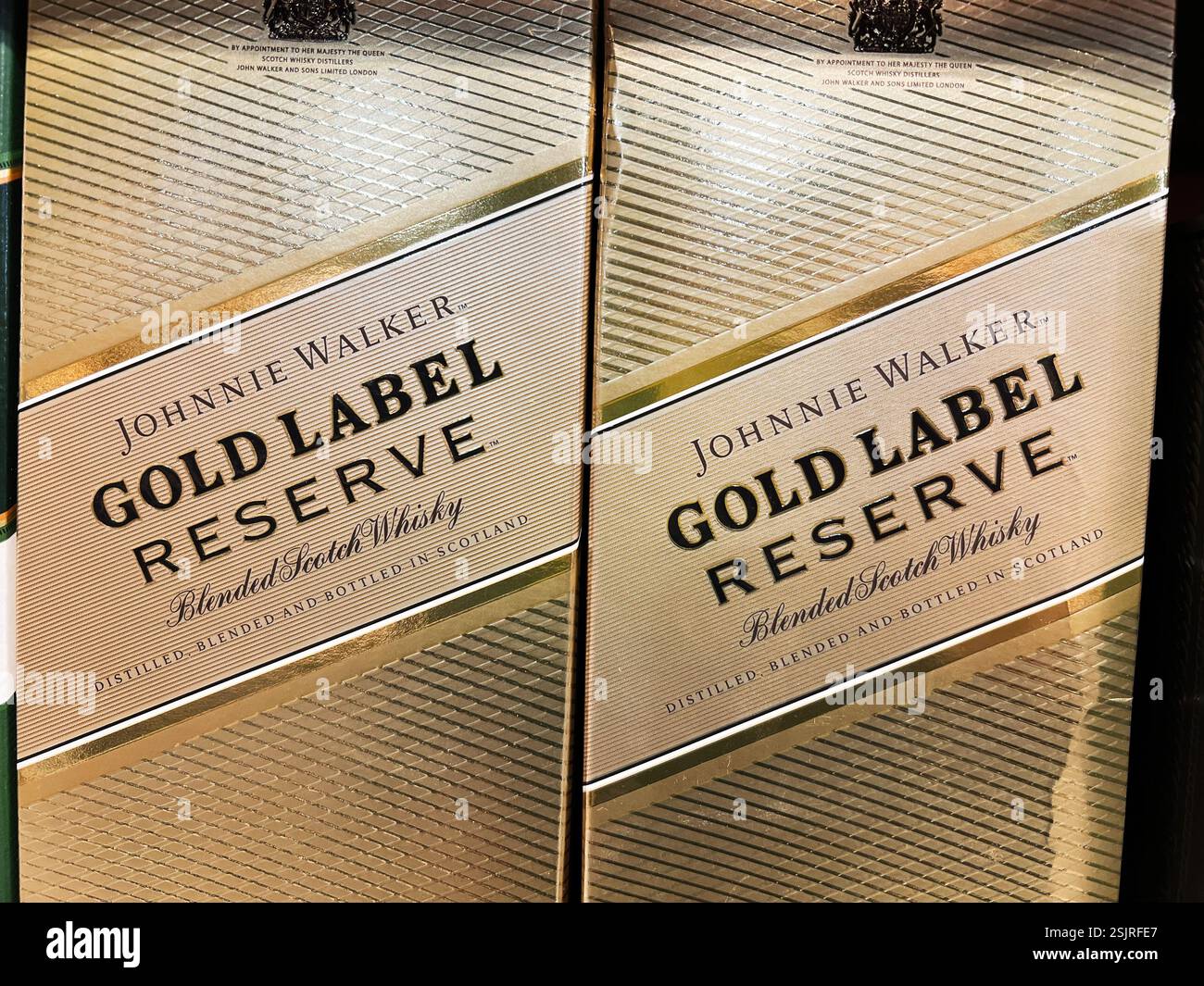 Kyiv, Ukraine - February 11, 2025: Golden boxes displaying Johnnie ...