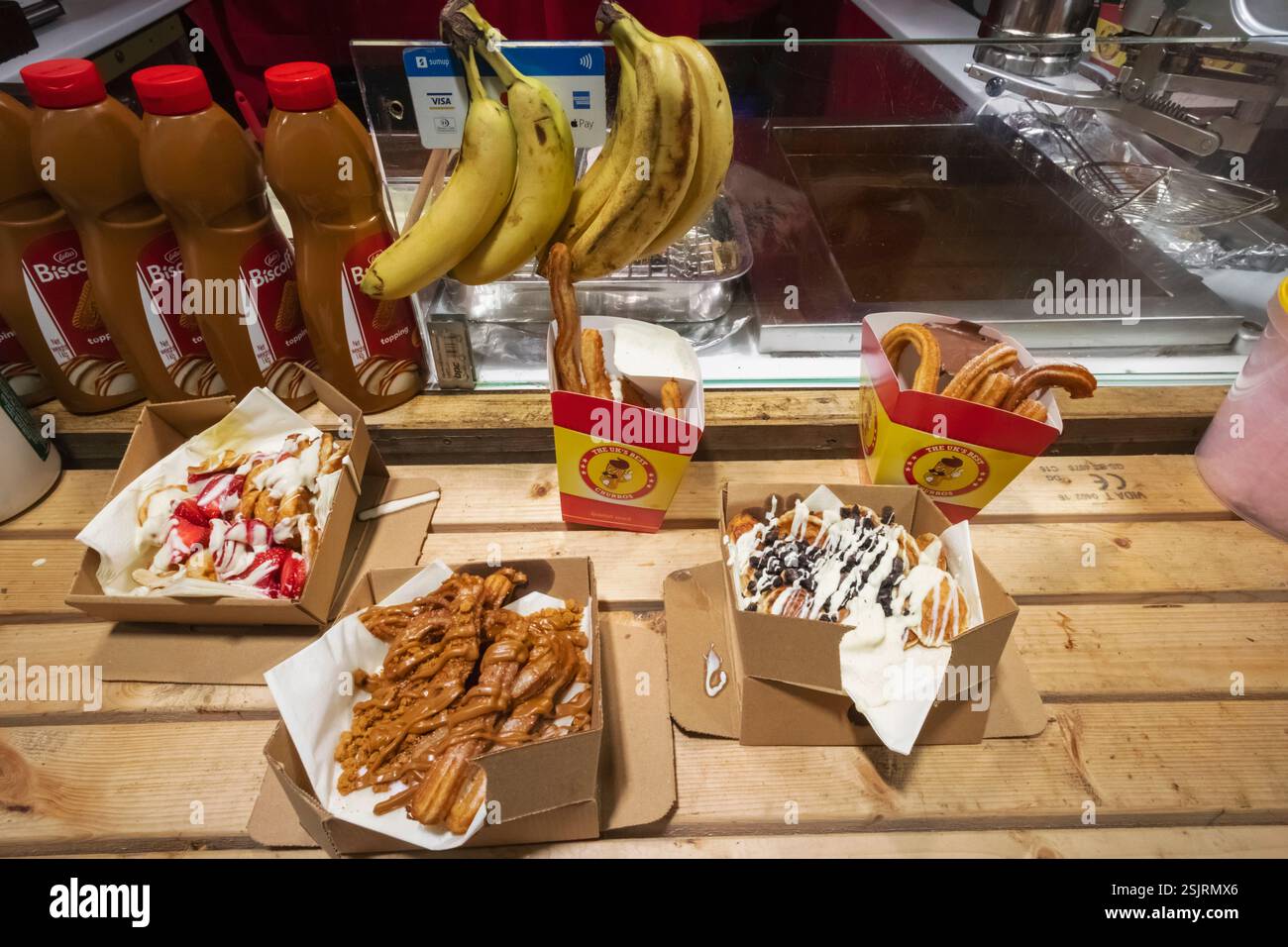 Market stall display of churros hi-res stock photography and images - Alamy