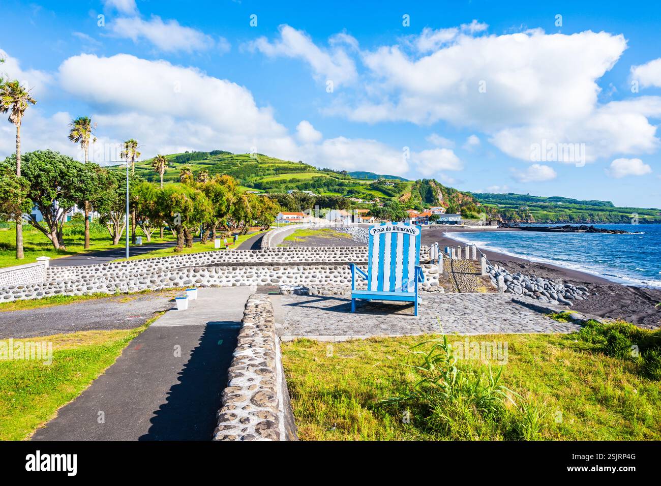 Coastal promenade along Almoxarife beach with azure ocean water, Faial ...
