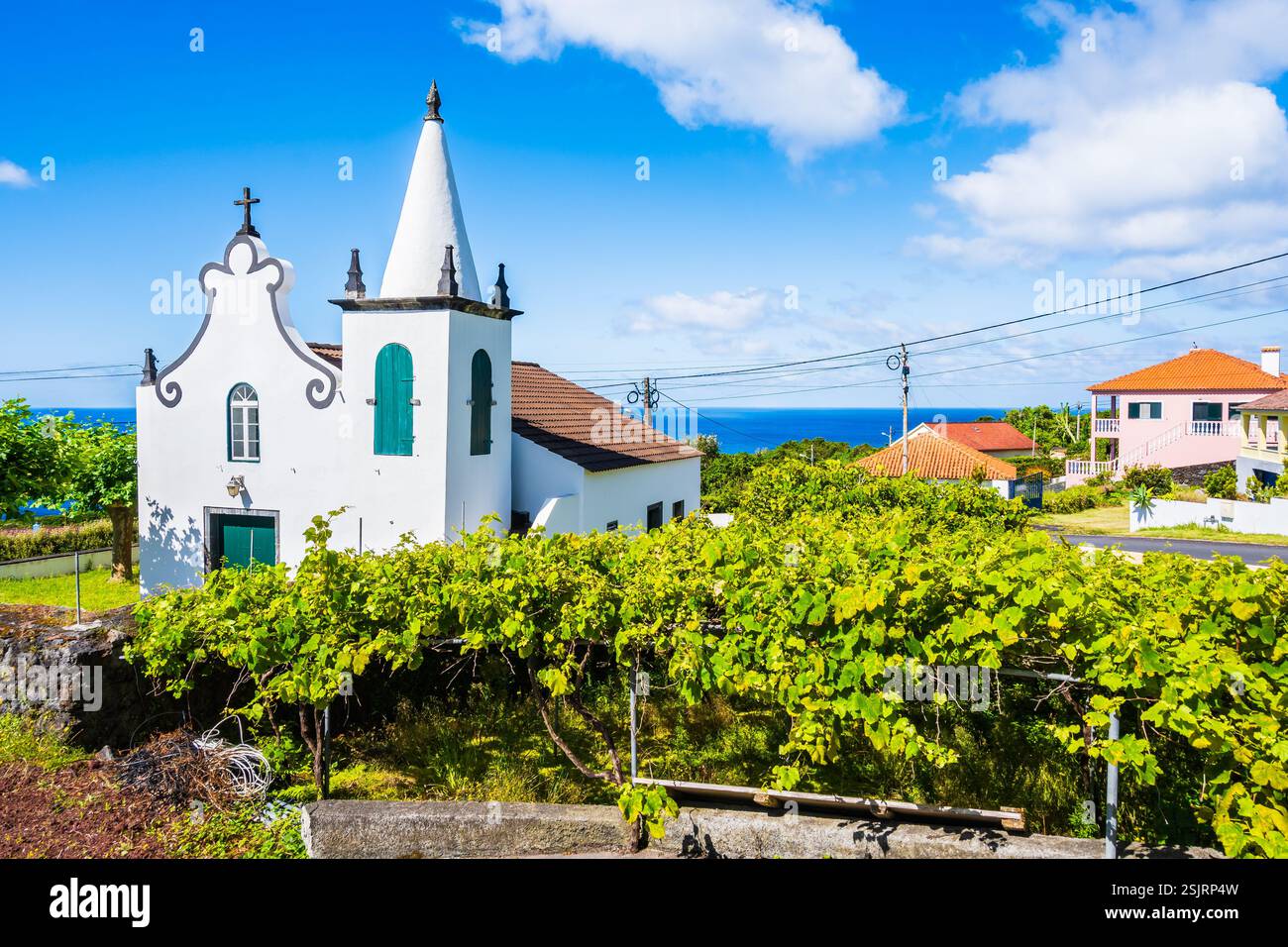 Small traditional style church in Varodouro village and grapevines ...