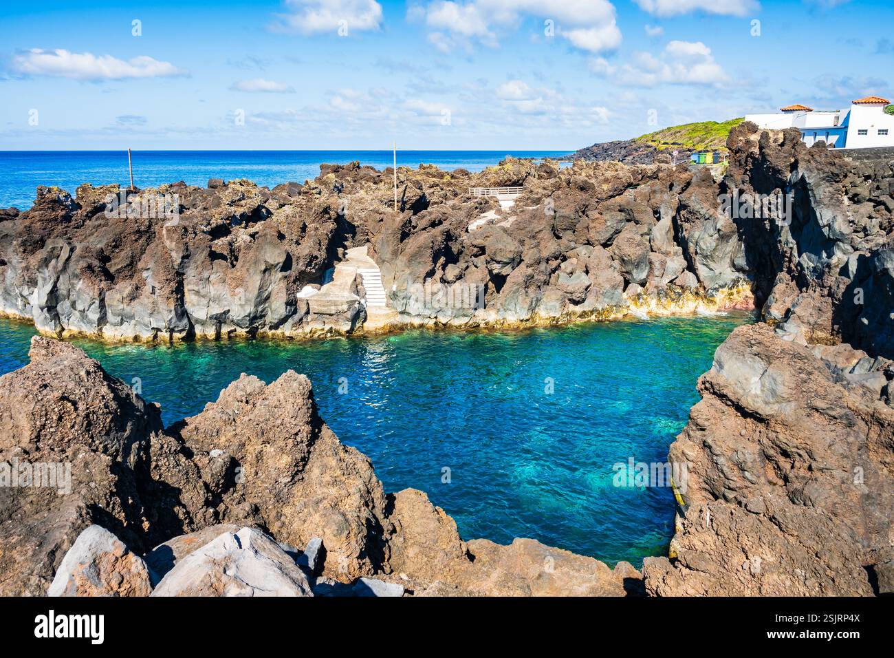 Natural pools with rocks and turquoise ocean water in Varadouro village ...