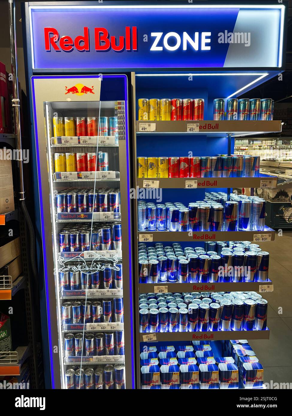 Kyiv, Ukraine - February 11, 2025: Shelves and fridge showcasing Red ...