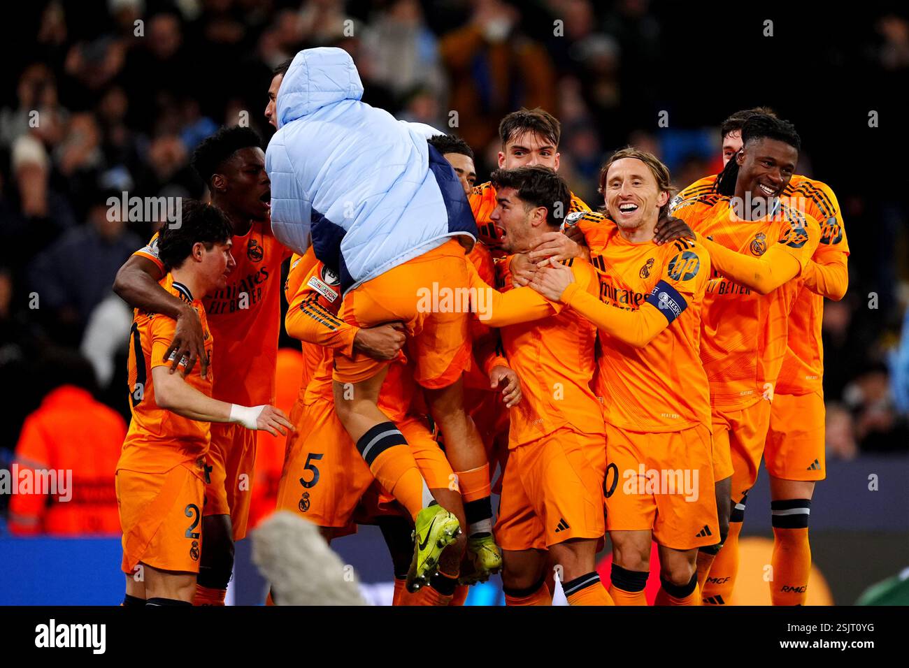 Real Madrid's Jude Bellingham (centre) celebrates scoring their side's ...