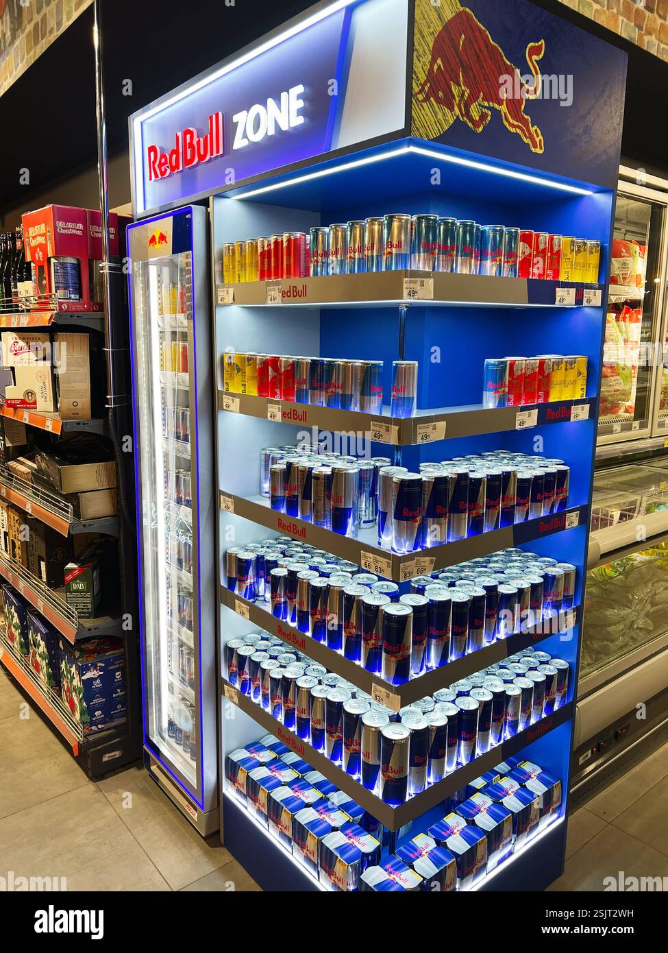 Kyiv, Ukraine - February 11, 2025: Shelves arranged with Red Bull ...
