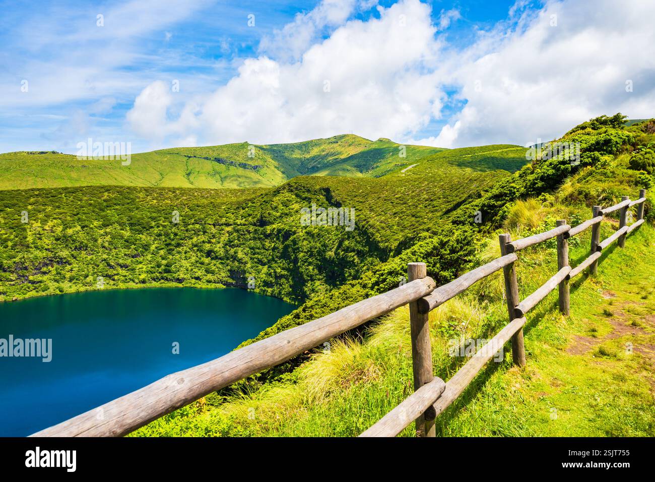View of lake in volcano caldera at Caldeira Negra, Flores island ...