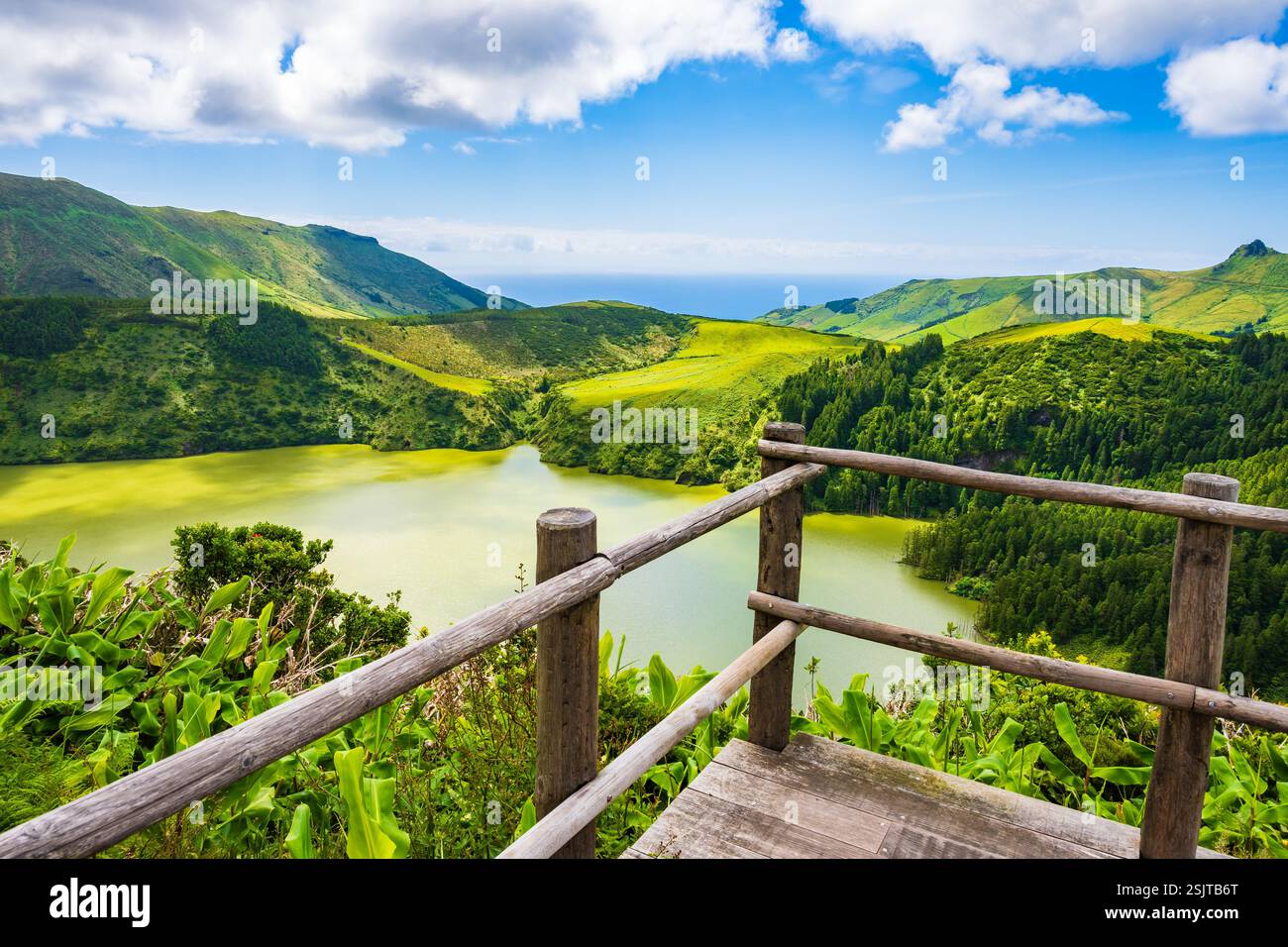 Viewpoint platform at green lake in volcano caldera at Rasa e Funda ...