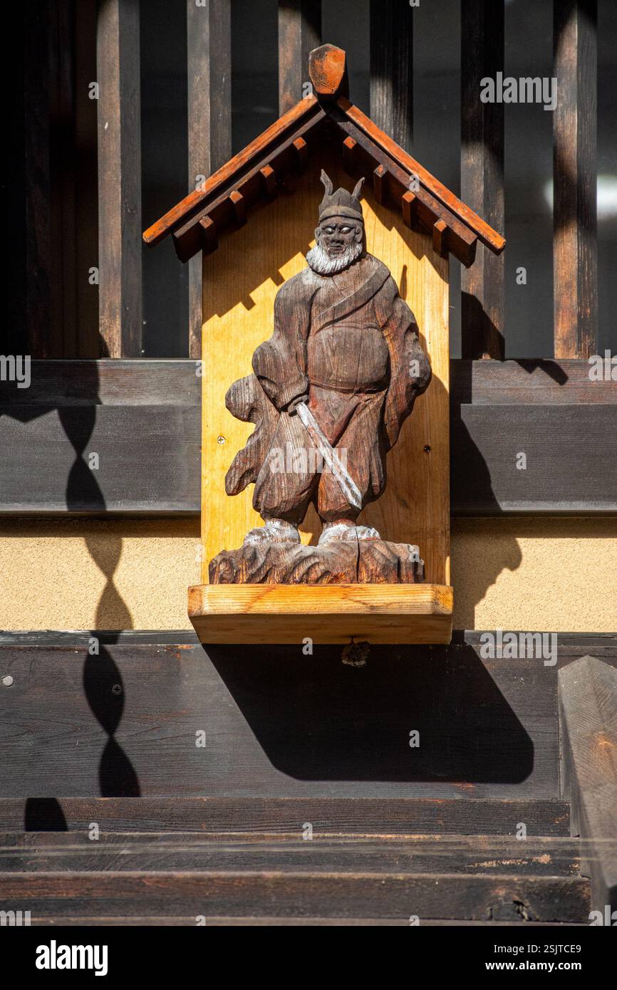Roadside Wooden sculpture, Japan Stock Photo - Alamy