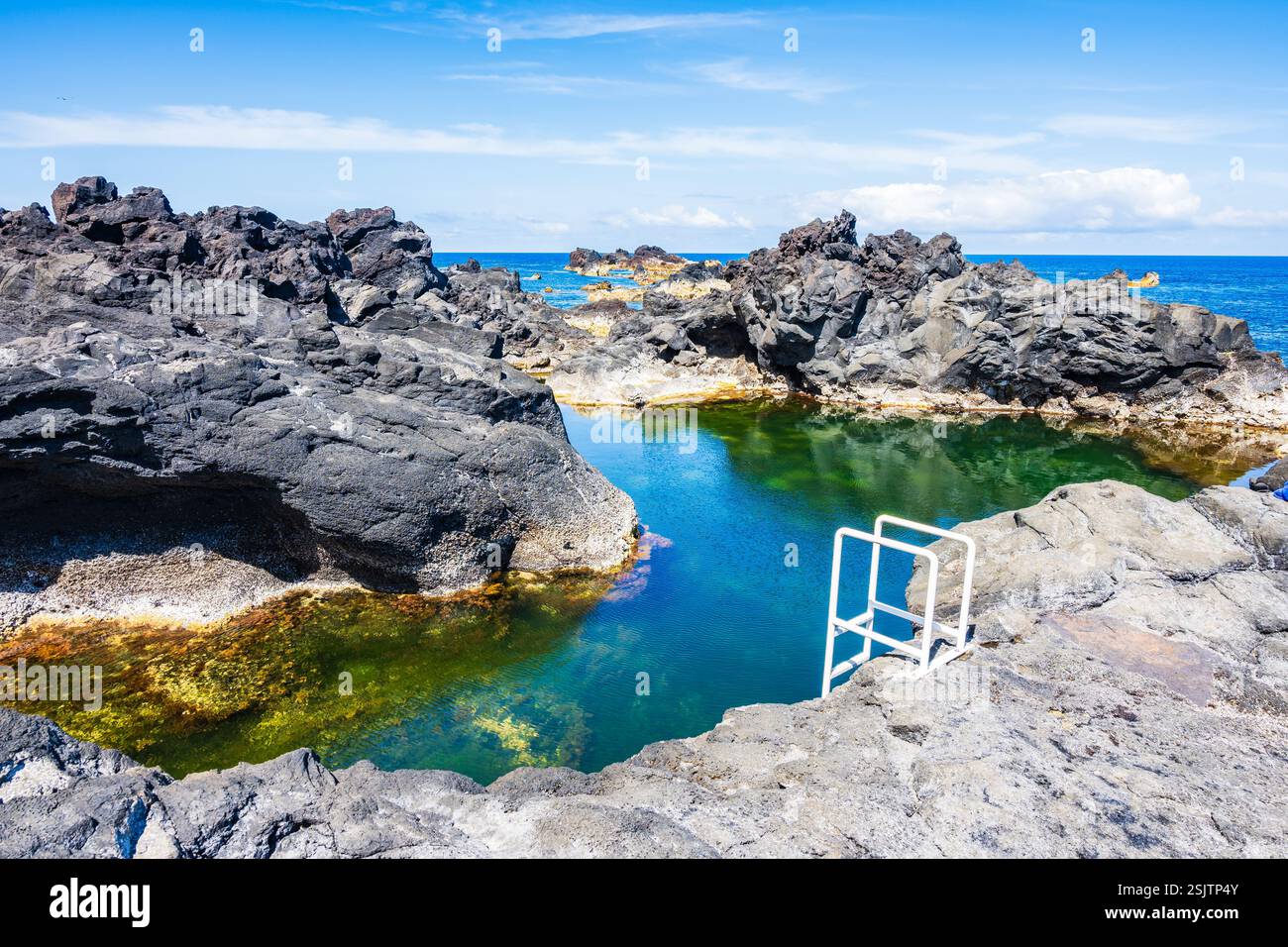 Natural swimming pools on rocky coast in Mosteiros town, Sao Miguel ...
