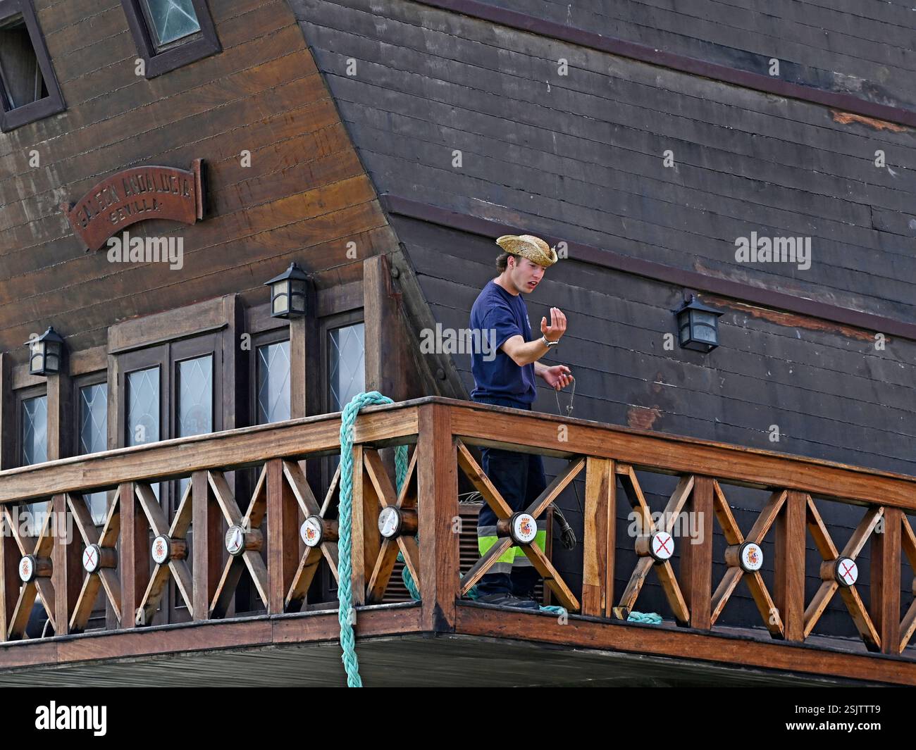 Crew member giving instructions during the berthing of the Andalucia, a ...