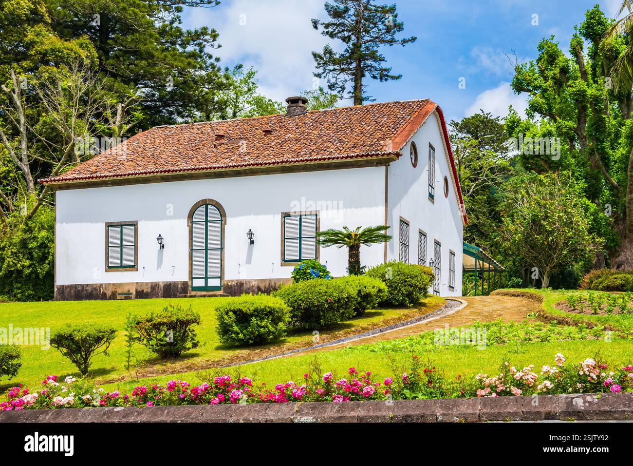 Historic traditional house and garden in Furnas village, famous place ...
