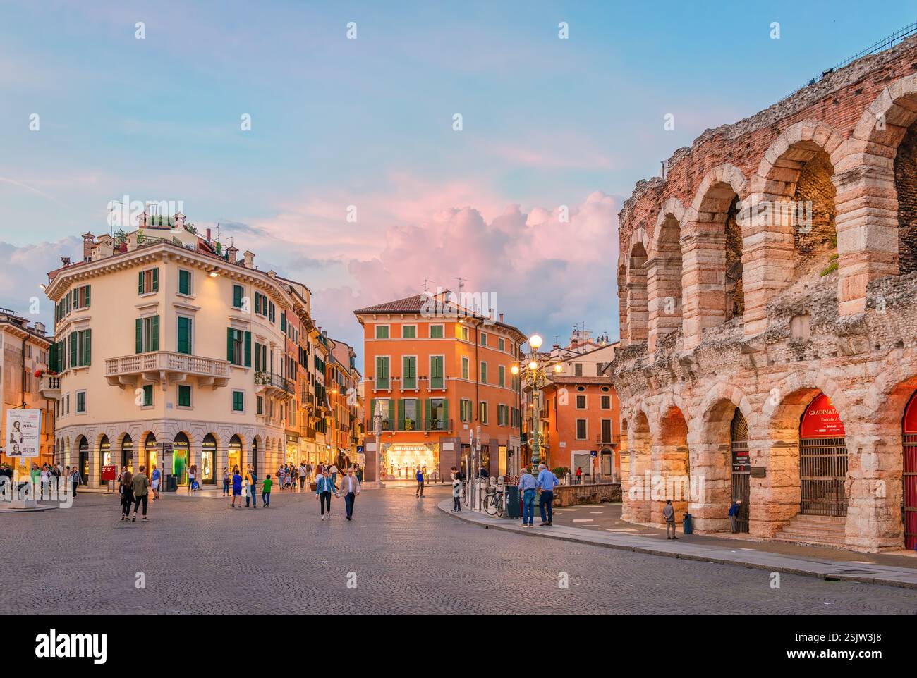 Night view of the Roman Arena and Piazza Bra in Verona, Italy. The ...