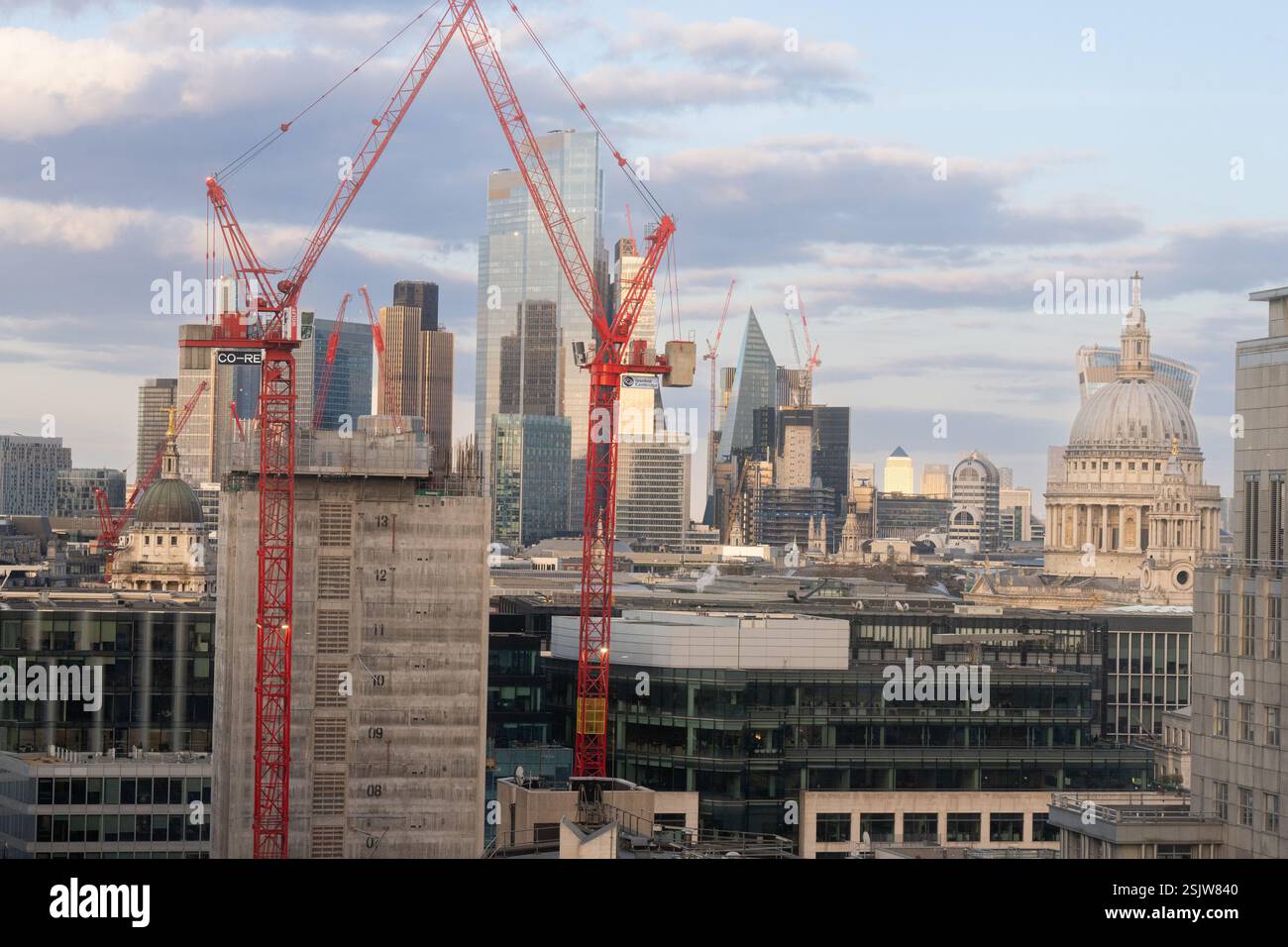 Construction cranes dominate the London skyline, near St. Paul's ...