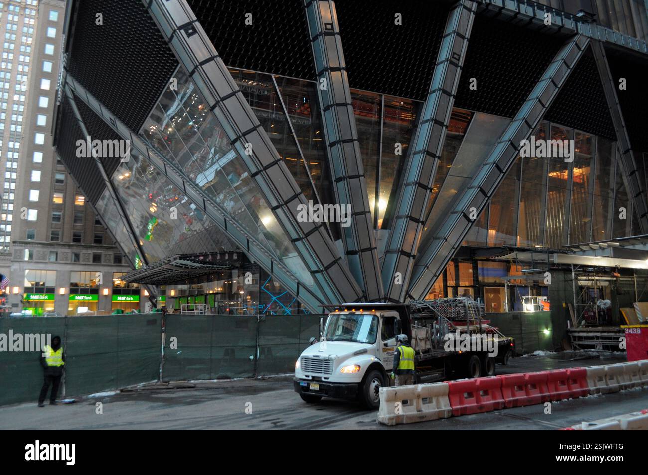 Workers stand at the JPMorgan Chase global headquarters building, which ...
