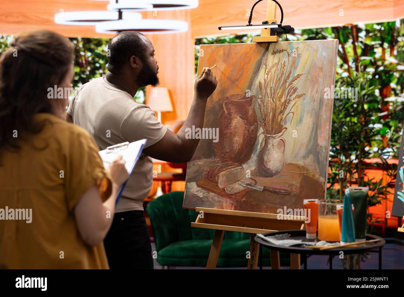 Painters team spend quality time on painting in their artistic studio ...