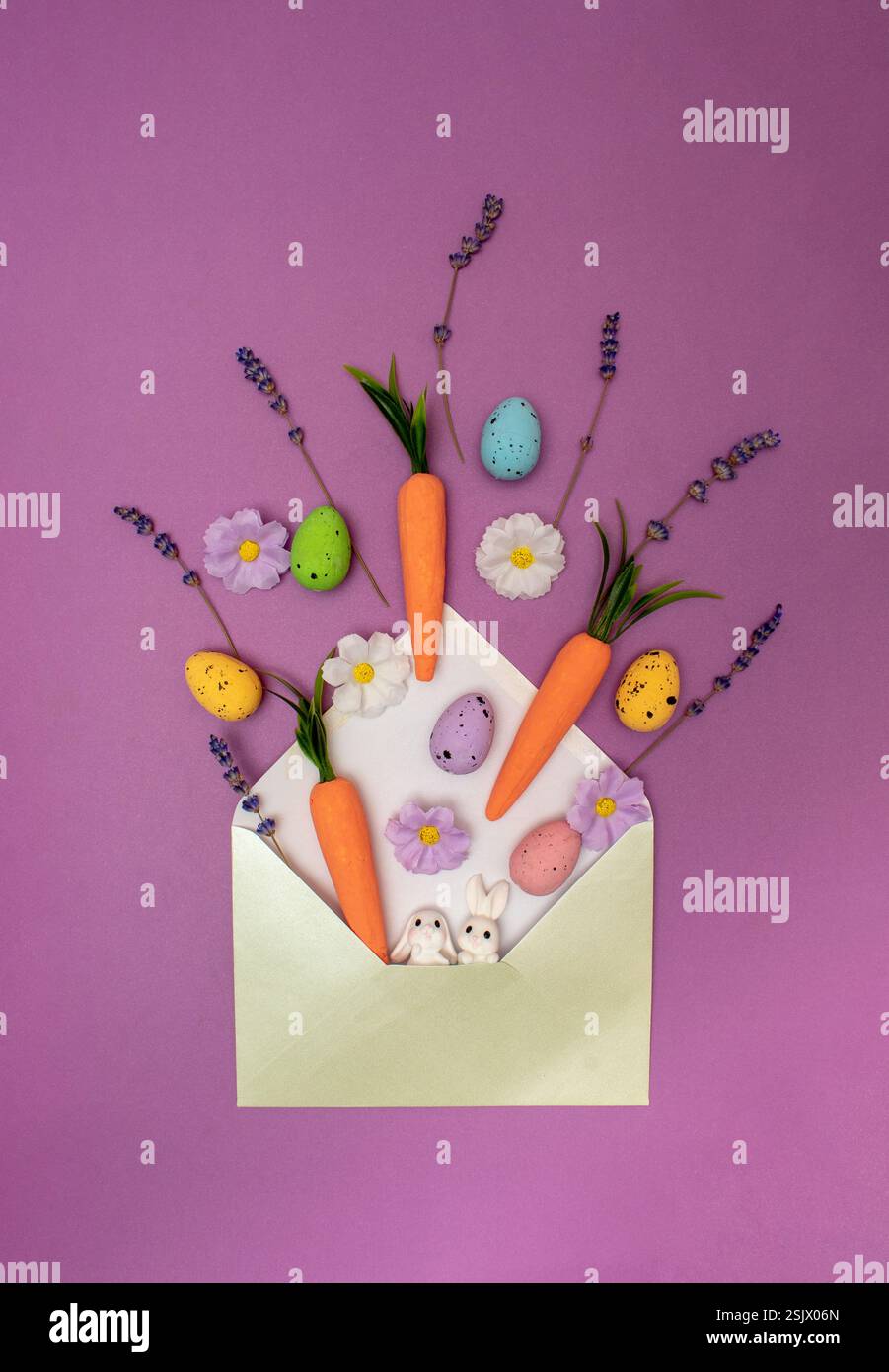 Spring flowers, Easter eggs and carrots coming out of envelope. Spring ...