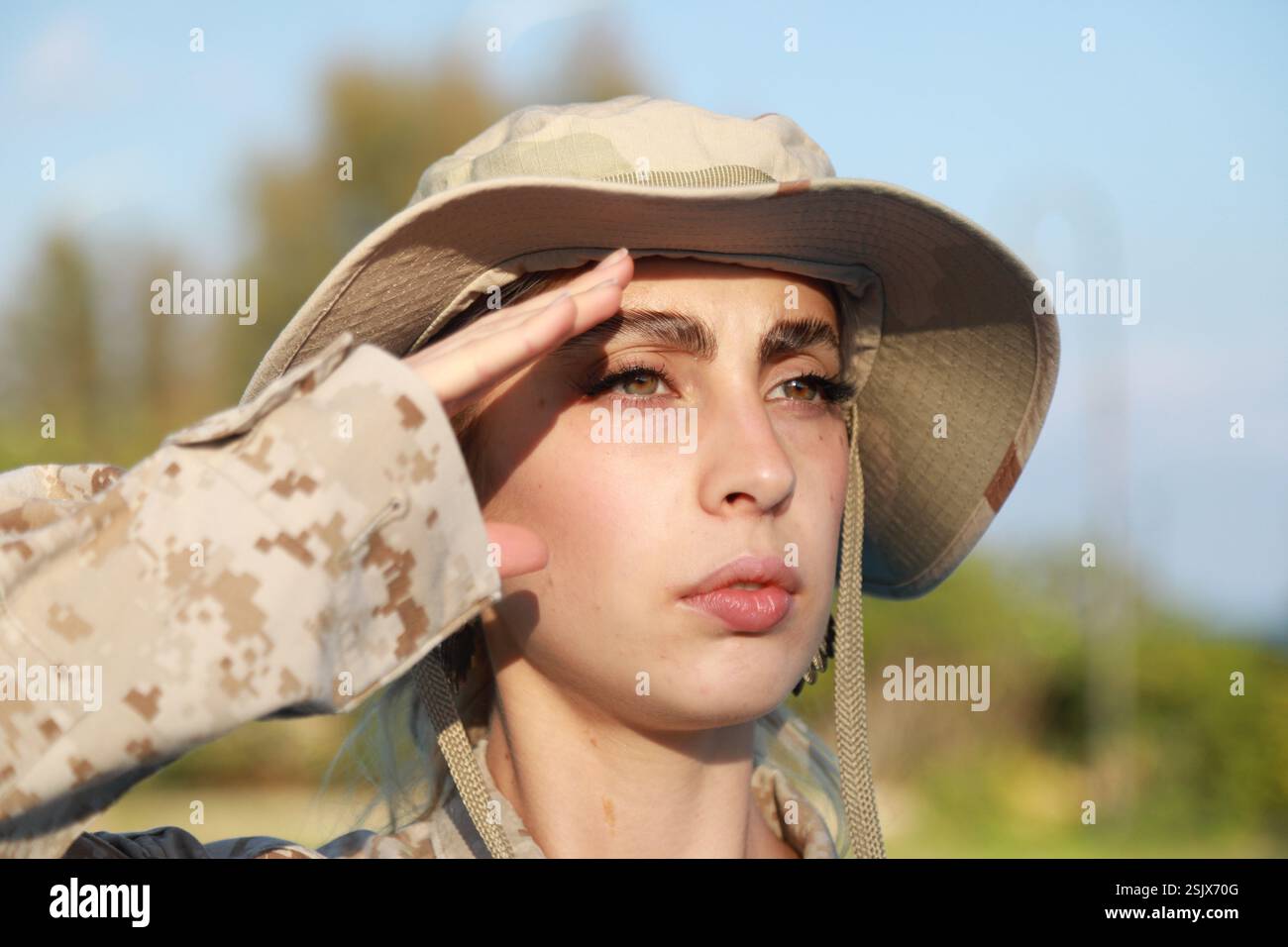 Female Soldier Defends with Pride and Honor Stock Photo - Alamy