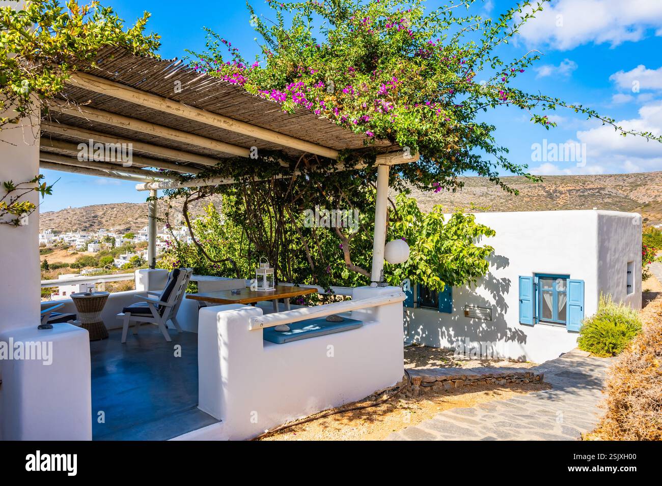 Terrace of a traditional Greek style apartment in Katapola village ...
