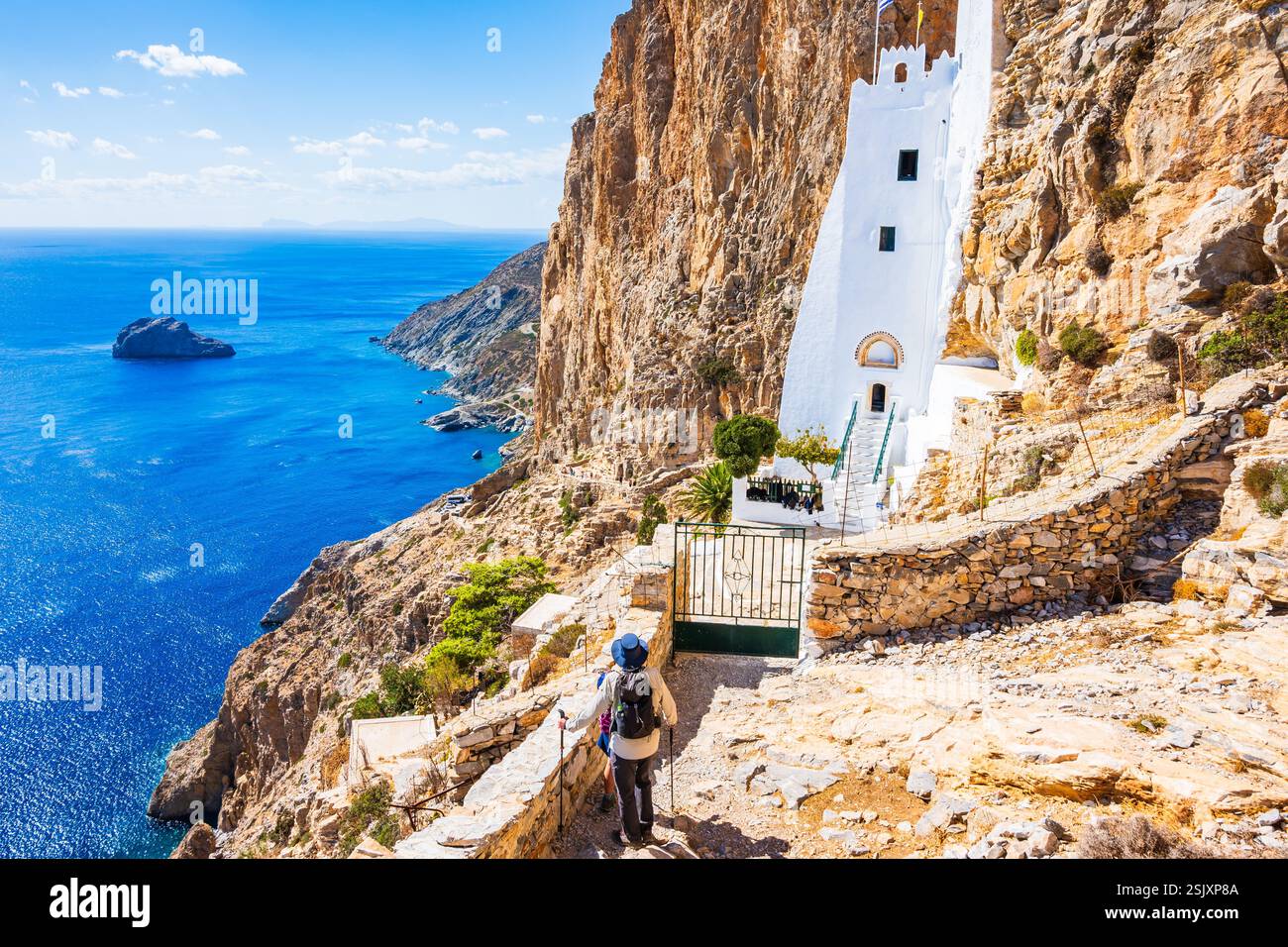 Famous white building of Panagia Hozoviotissa monastery hanging on the ...