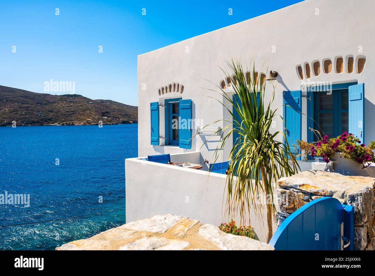Typical Greek style apartments on sea coast in Katapola village ...