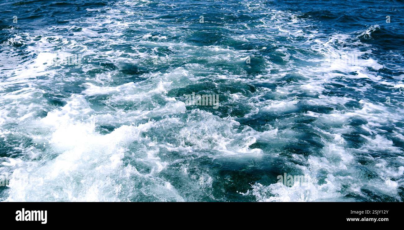 Baltic Sea, Denmark: Stern wave of a small excursion and fishing boat ...