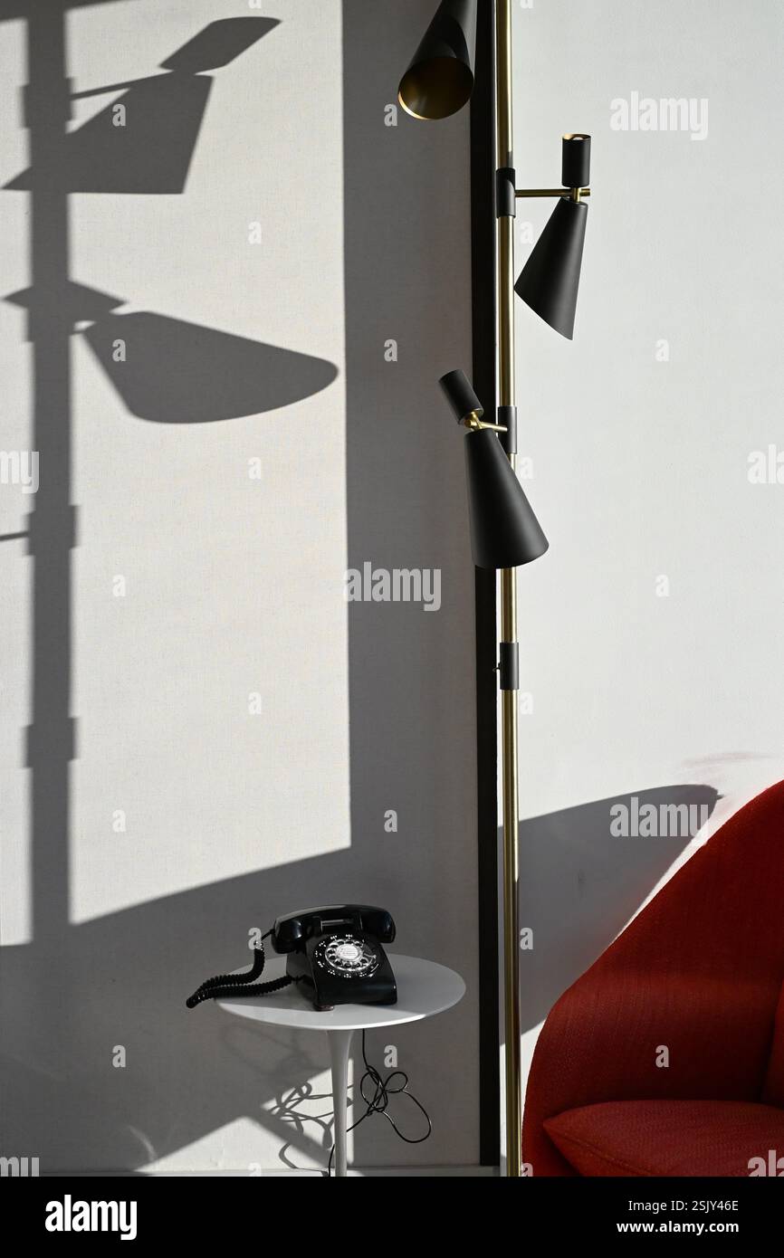 Room at the TWA hotel - A vintage telephone rests on a small table ...