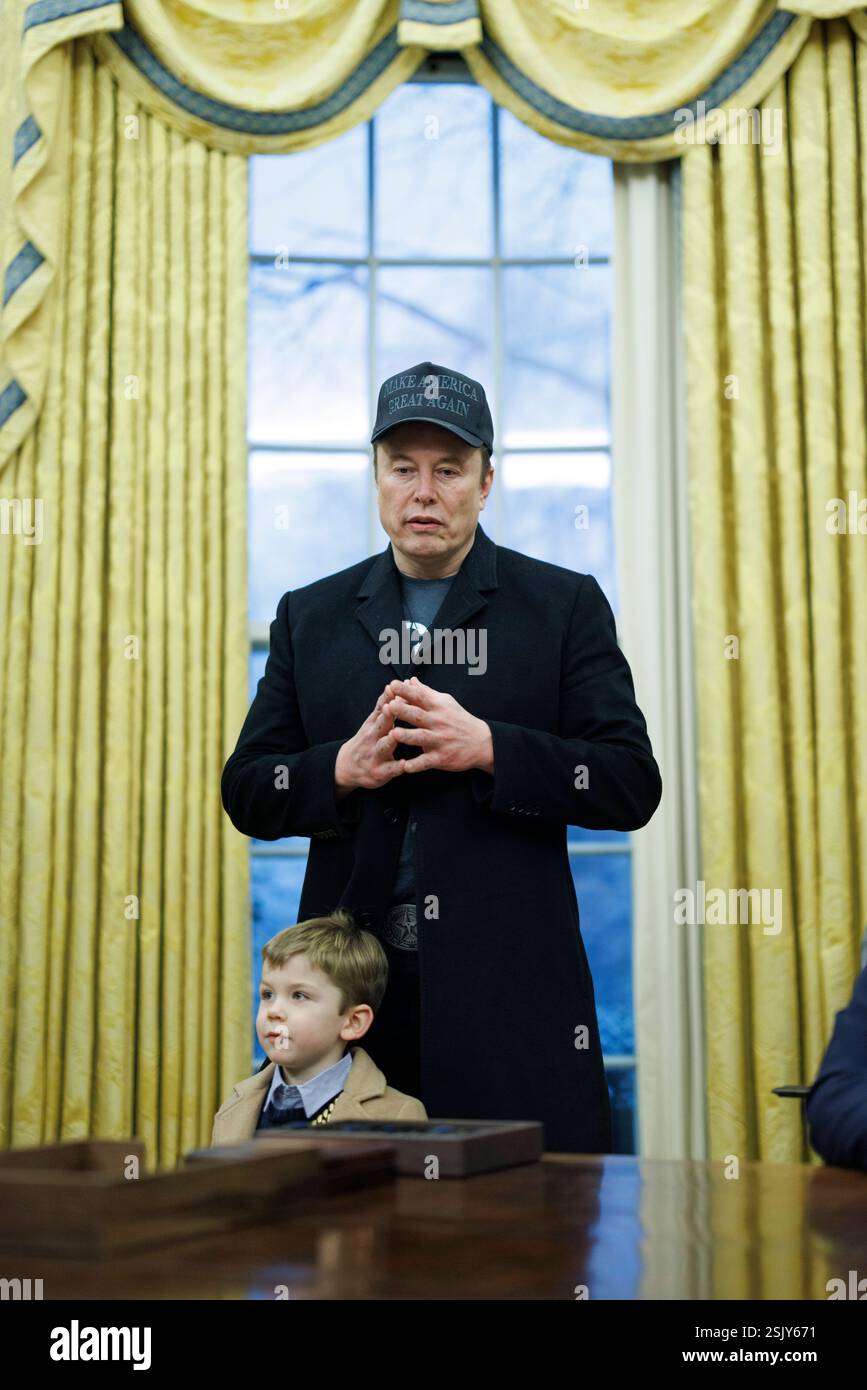Elon Musk is seen with his son X, as he gives remarks to the media, in ...