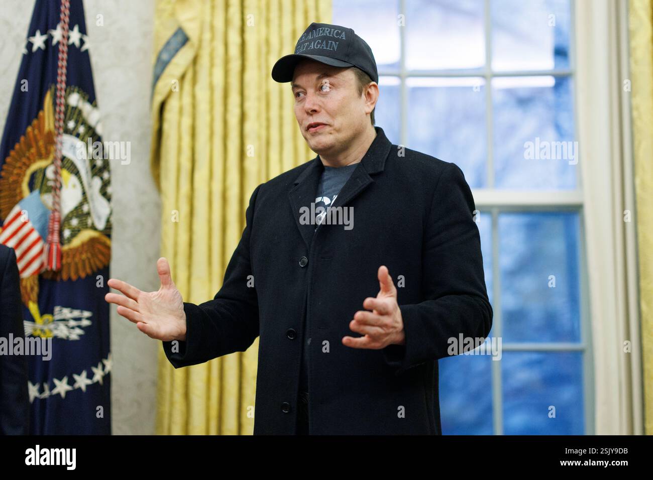 Elon Musk gives remarks to the media in the Oval Office of the White ...