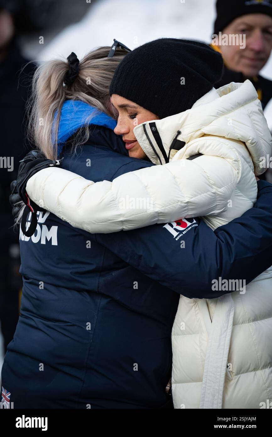 The Duchess of Sussex embraces a member of team UK at the Hillcrest ...