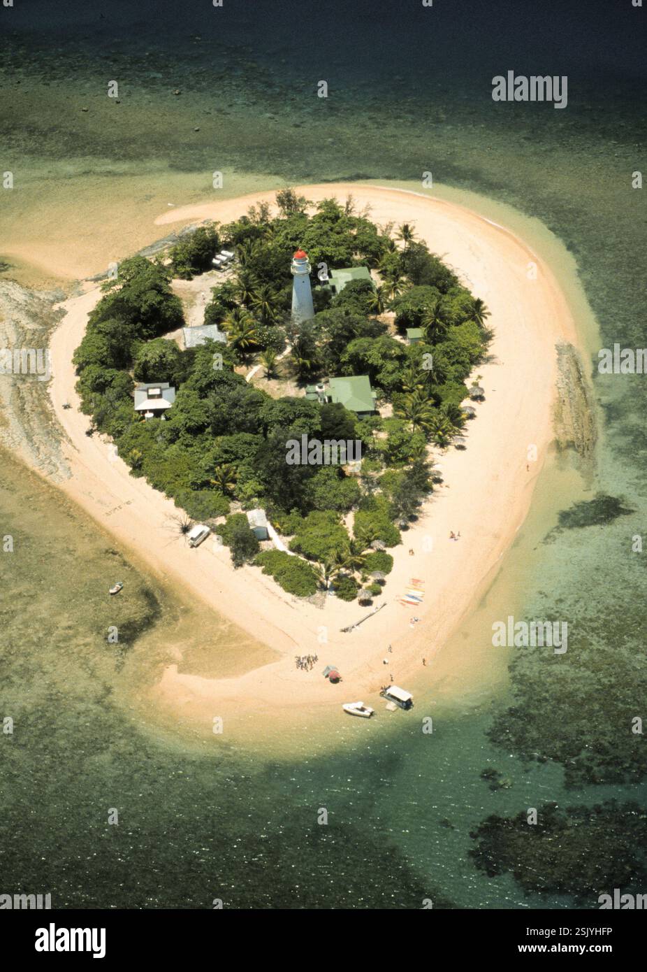 low island with lighthouse off the coast of north Queensland ,on the ...