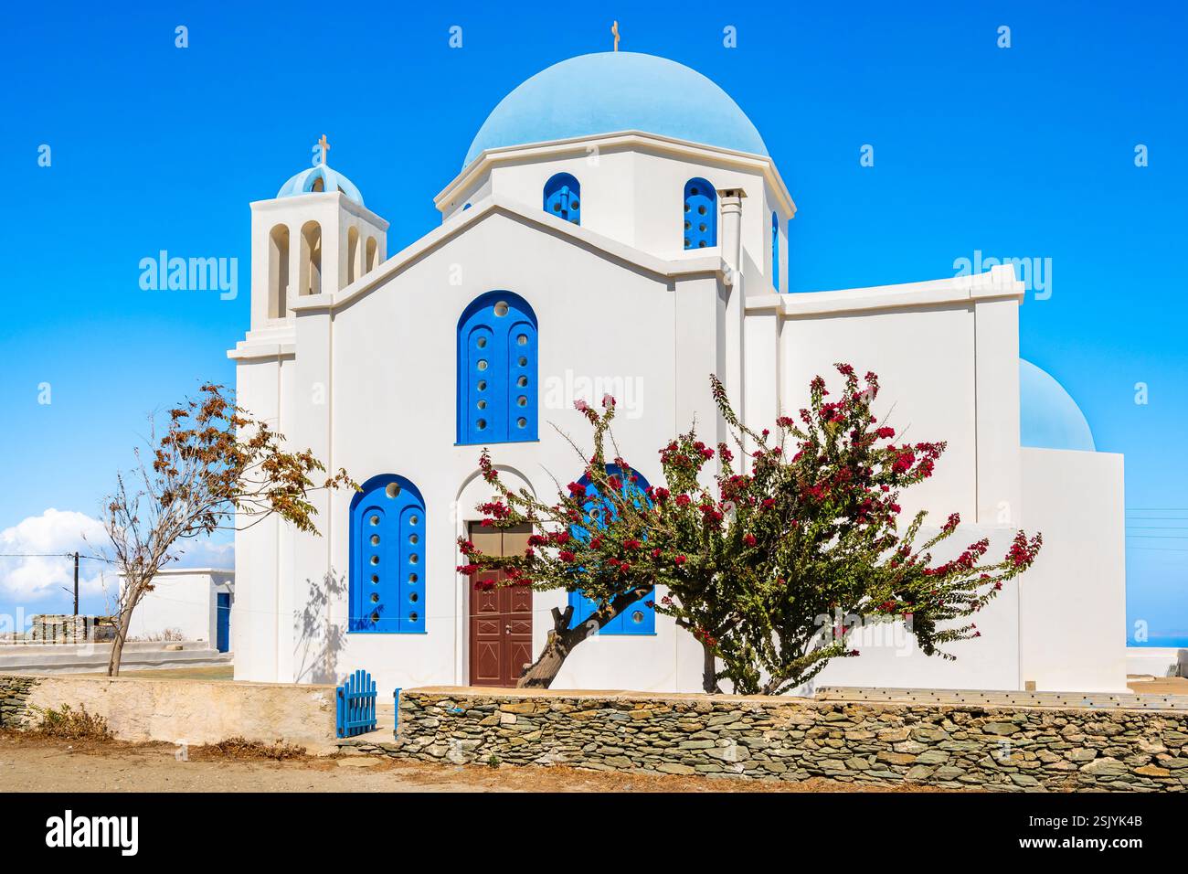 Typical whitewashed traditional Greek church with blue dome in Ano ...