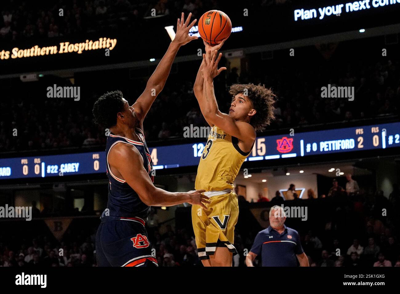 Vanderbilt guard Tyler Tanner (3) shoots the ball over Auburn center ...