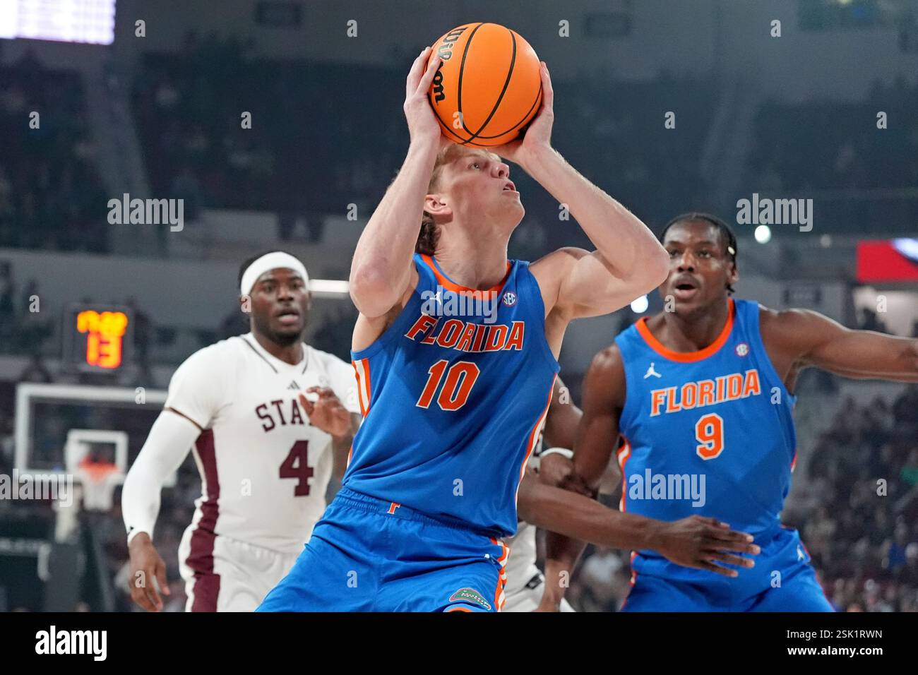 Florida forward Thomas Haugh (10) looks for an open shot during the ...