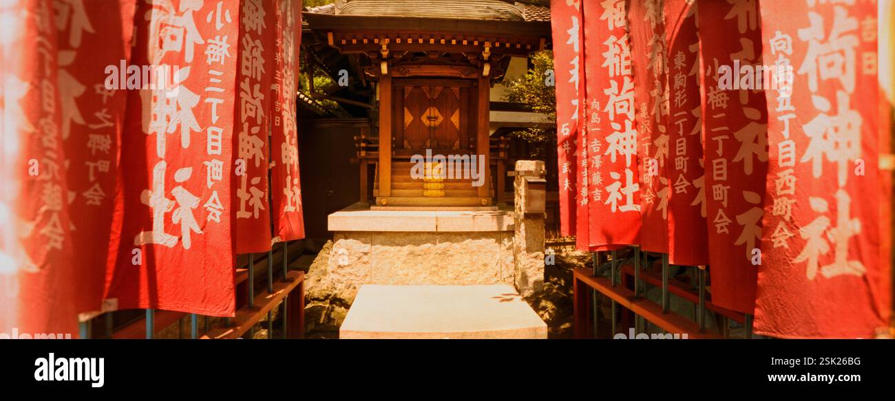 Entrance of a shrine lined with flags, Tokyo Prefecture, Japan Stock ...