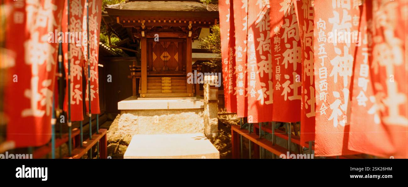Entrance of a shrine lined with flags, Tokyo Prefecture, Japan Stock ...