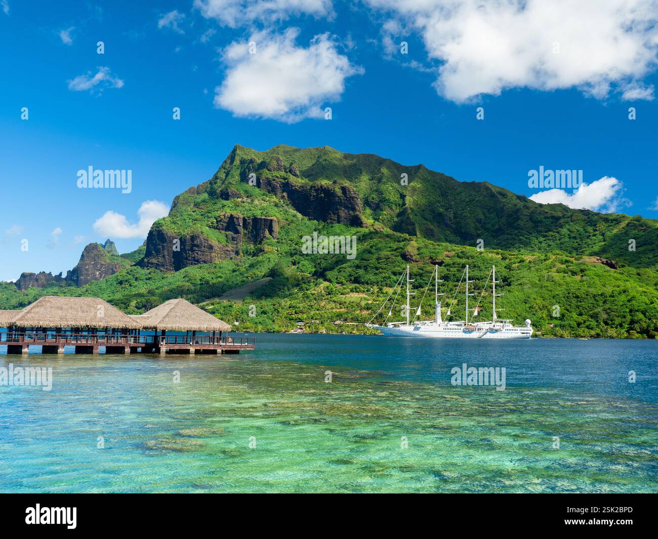 Sailing boat anchored in Moorea Stock Photo - Alamy